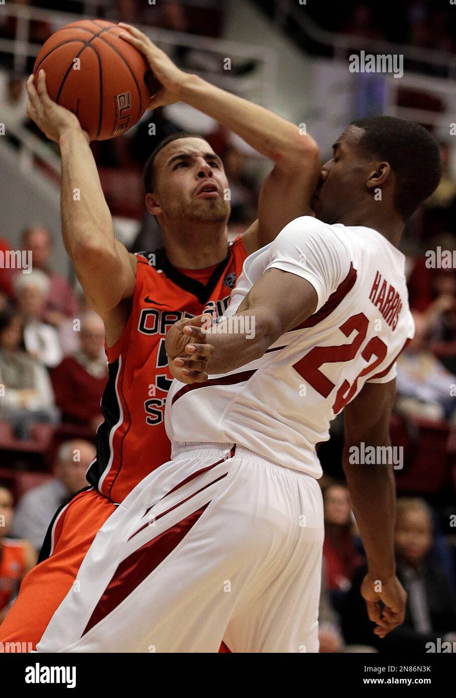 Oregon State's Roberto Nelson, left, shoots against Stanford's Gabriel ...