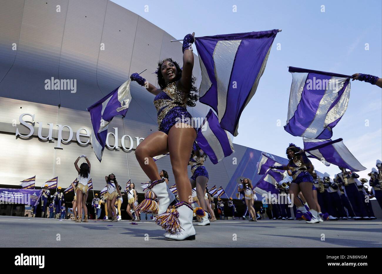 The Warren Easton High School marching band performs before the NFL ...