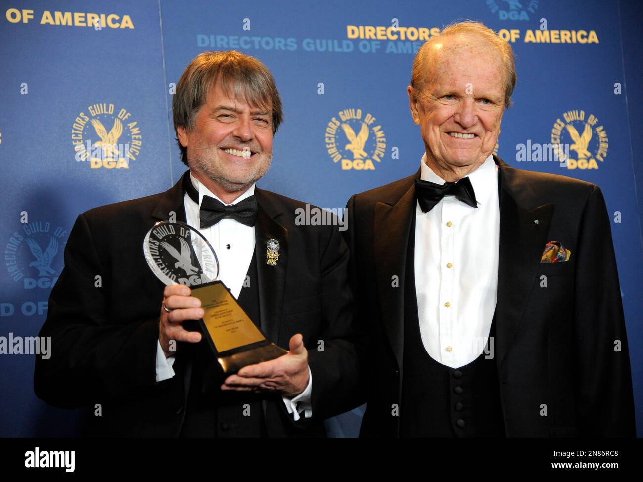 George Stevens Jr., right, poses with Dency Nelson and his Franklin J ...