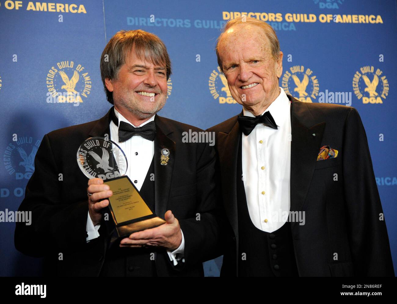 George Stevens Jr., right, poses with Dency Nelson and his Franklin J ...