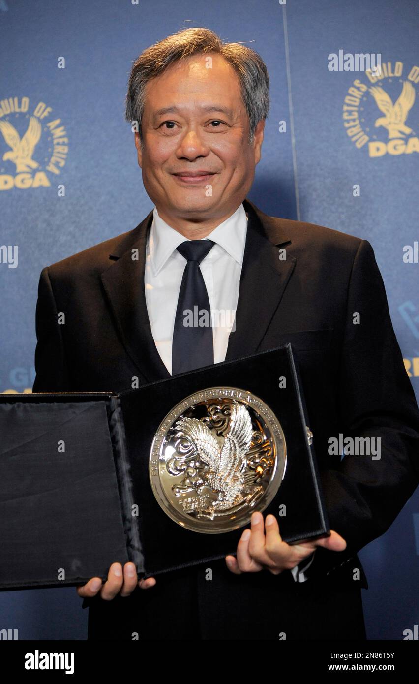 Ang Lee poses backstage with his feature film nomination plaque for ...