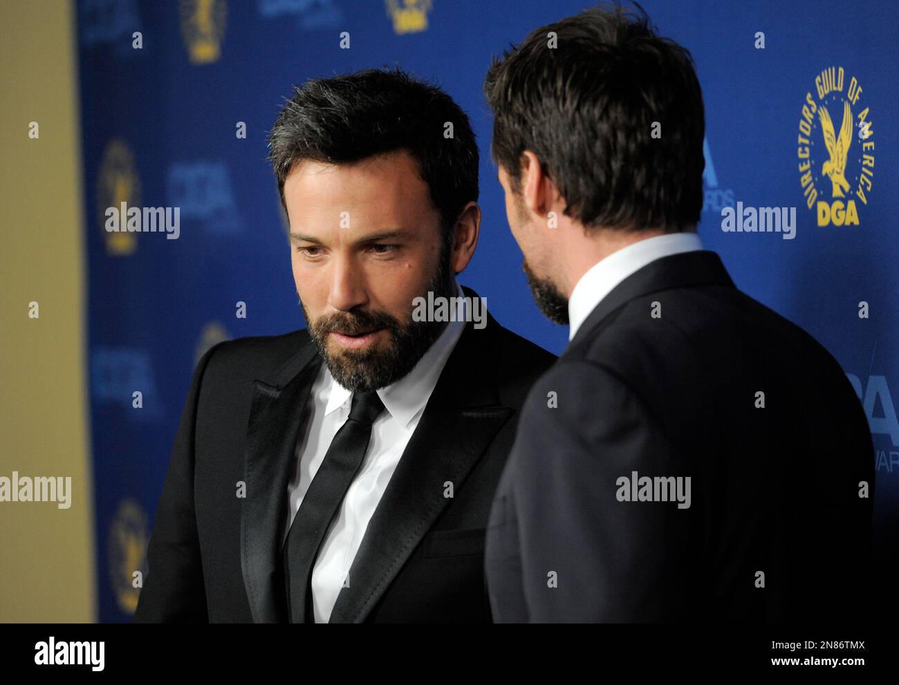 Ben Affleck, left, and Hugh Jackman arrive at the 65th Annual Directors ...