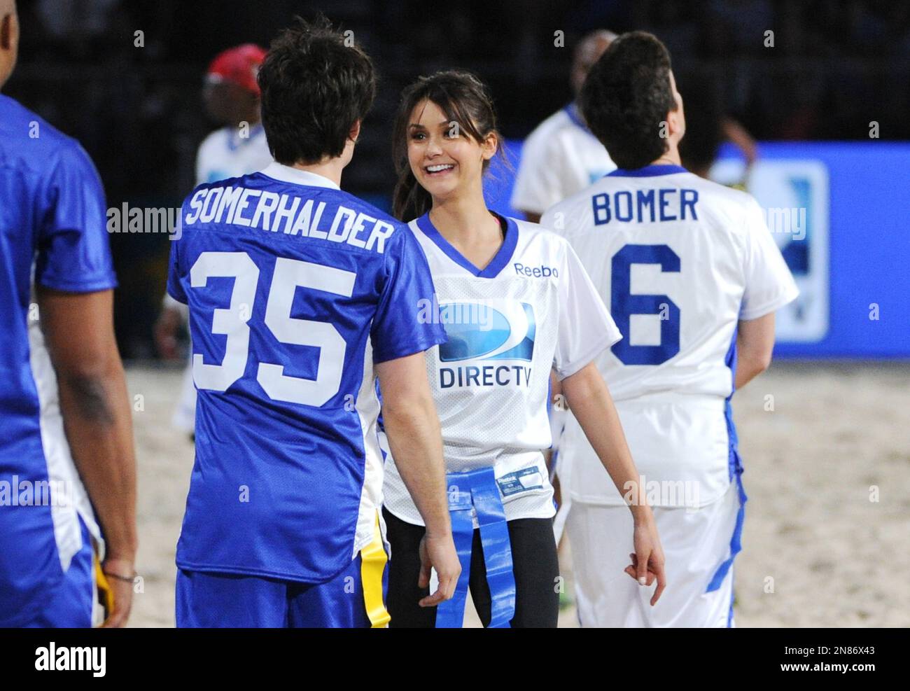 Actress Nina Dobrev and boyfriend Ian Somerholder chat during Directv's ...