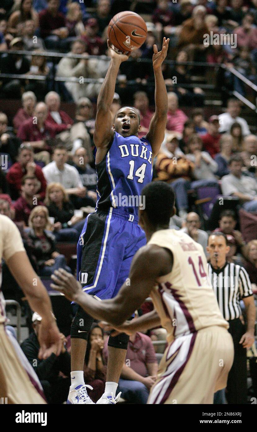 Duke's Rasheed Sulaimon shoots and scores over the defense of Florida ...