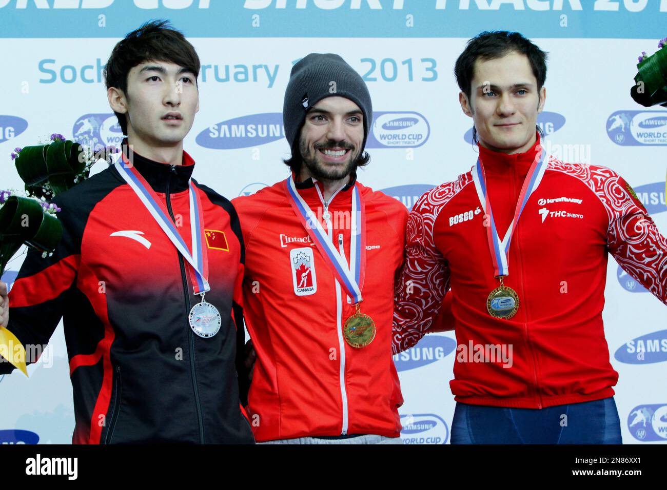 From left, China's second-placed Wu Daijing, Canada's winner Charles Hamelin and Russia's third ...