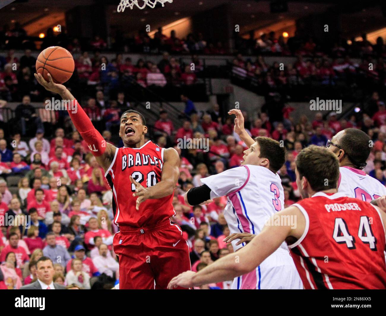 Bradley's Tyshon Pickett (20) goes for a layup against Creighton's Doug ...