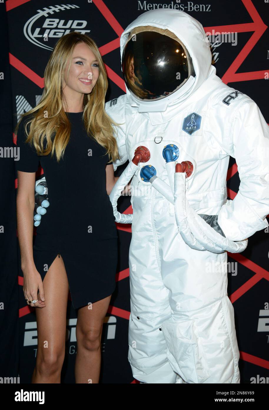 Model Candice Swanepoel, left, and an AXE astronaut arrive at ESPN The Magazine's "Next" Event ...