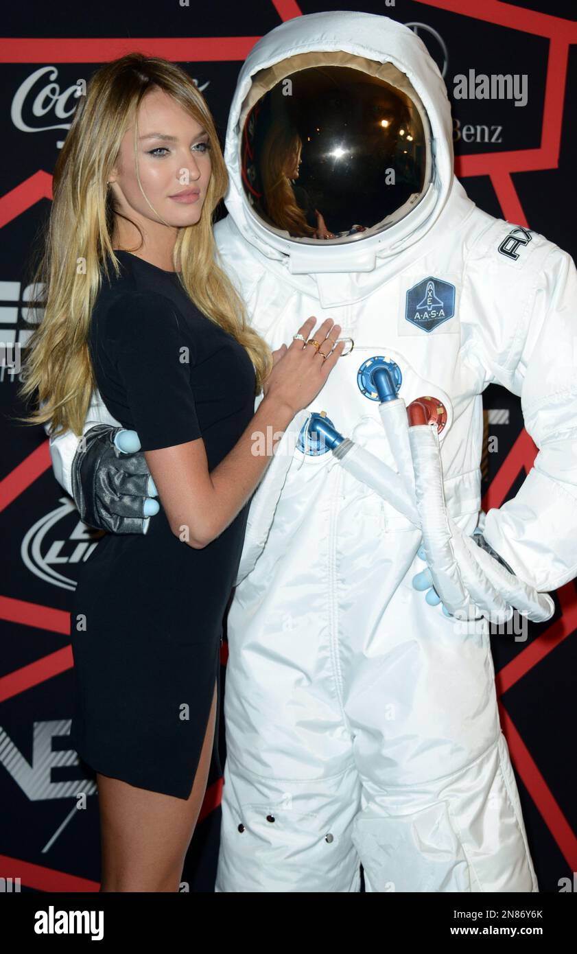 Model Candice Swanepoel, left, and an AXE astronaut arrive at ESPN The Magazine's "Next" Event ...