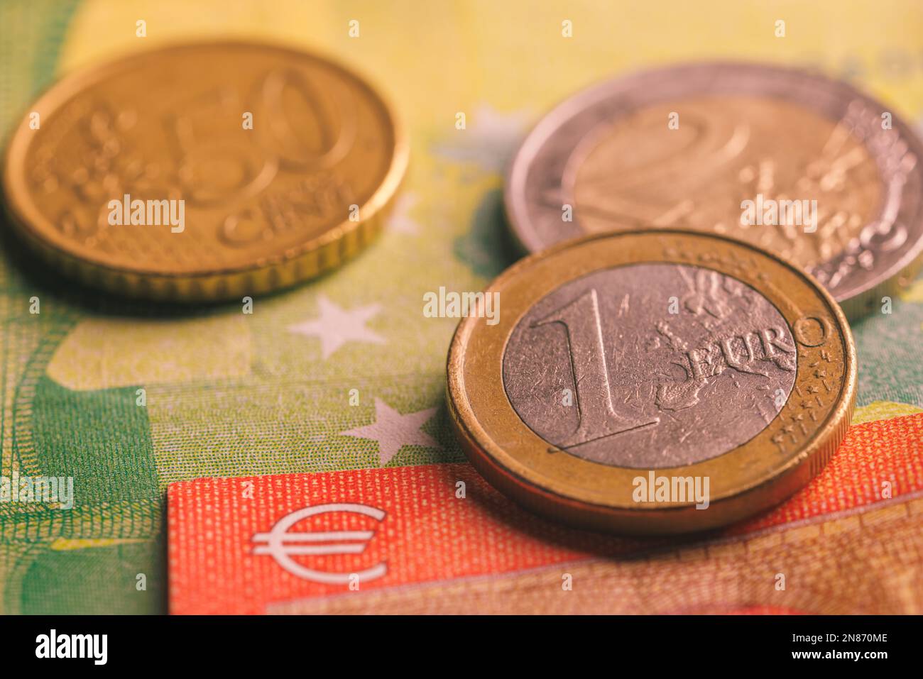Pile of euro coins on euro notes Stock Photo - Alamy