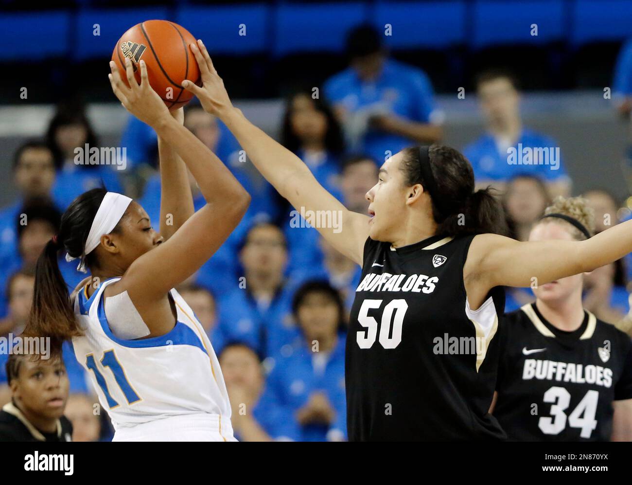 Colorado forward Jamee Swan (50) defends against UCLA guard Brittany ...