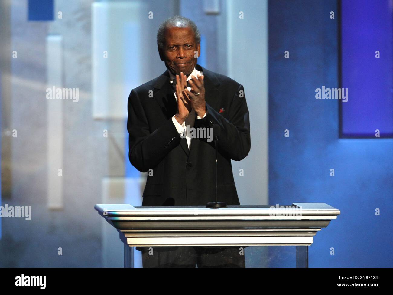 Sidney Poitier presents the Spingarn award to Harry Belafonte at the ...