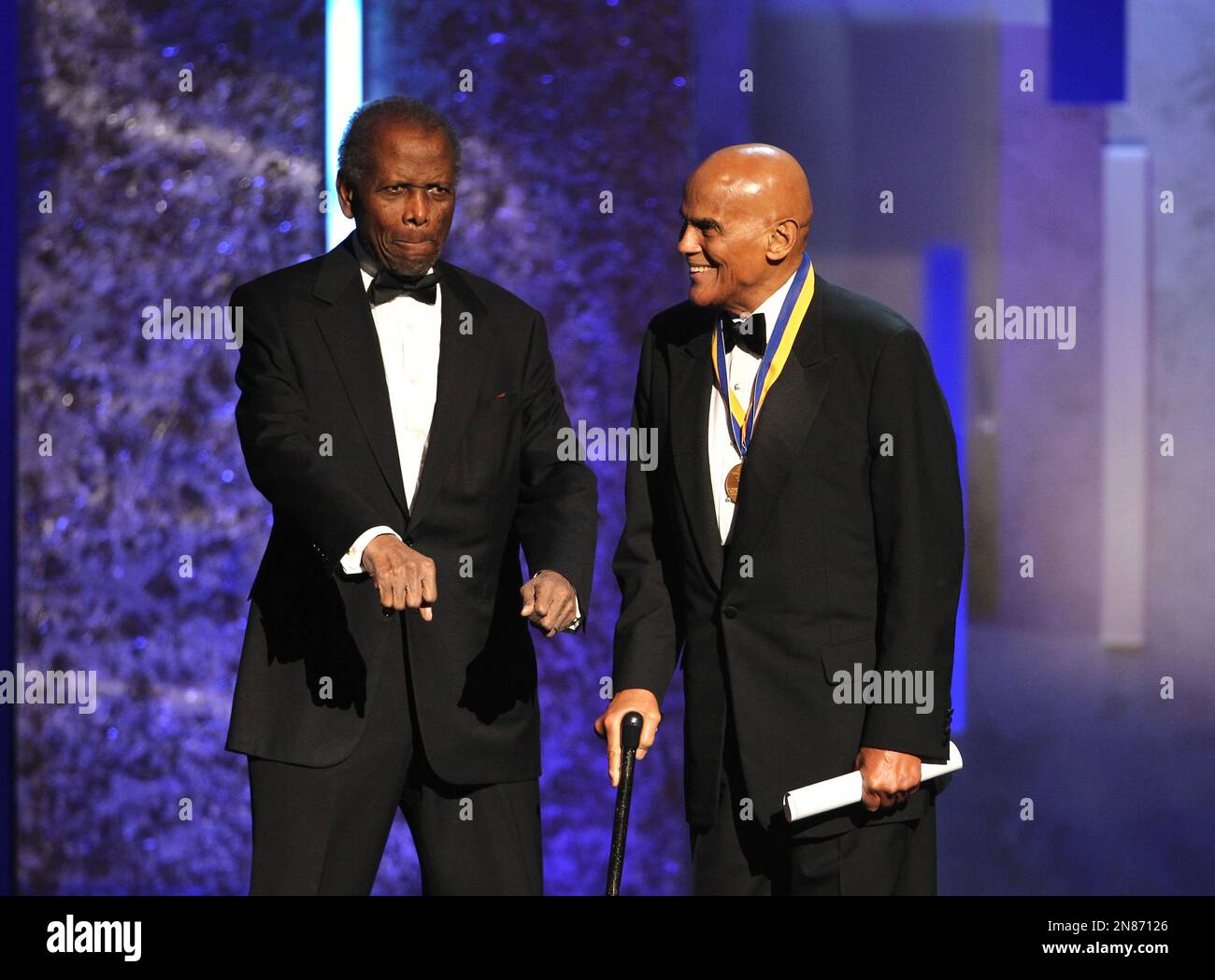 Sidney Poitier, left, presents the Spingarn award to Harry Belafonte at ...