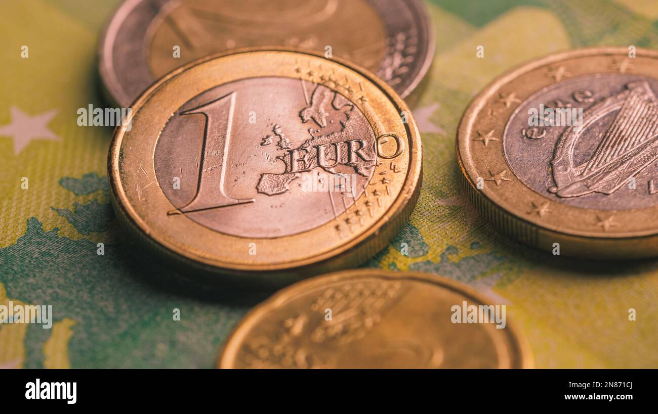 Pile of euro coins on euro notes Stock Photo - Alamy