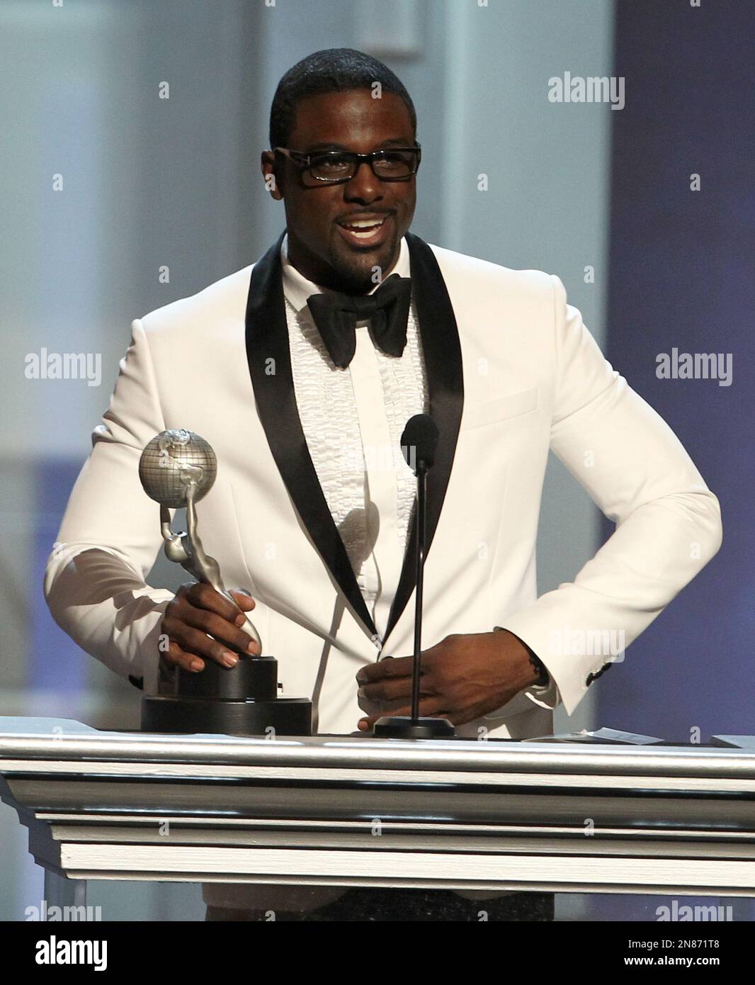 Lance Gross accepts the award for outstanding supporting actor in a ...