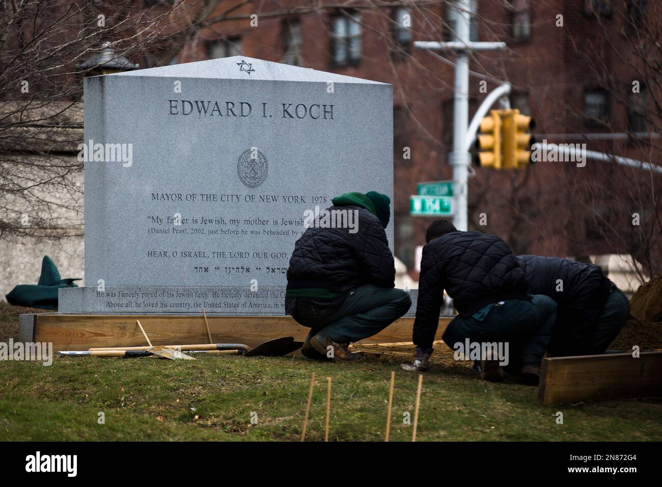 Workers at the Trinity Church Cemetery prepare former New York City ...