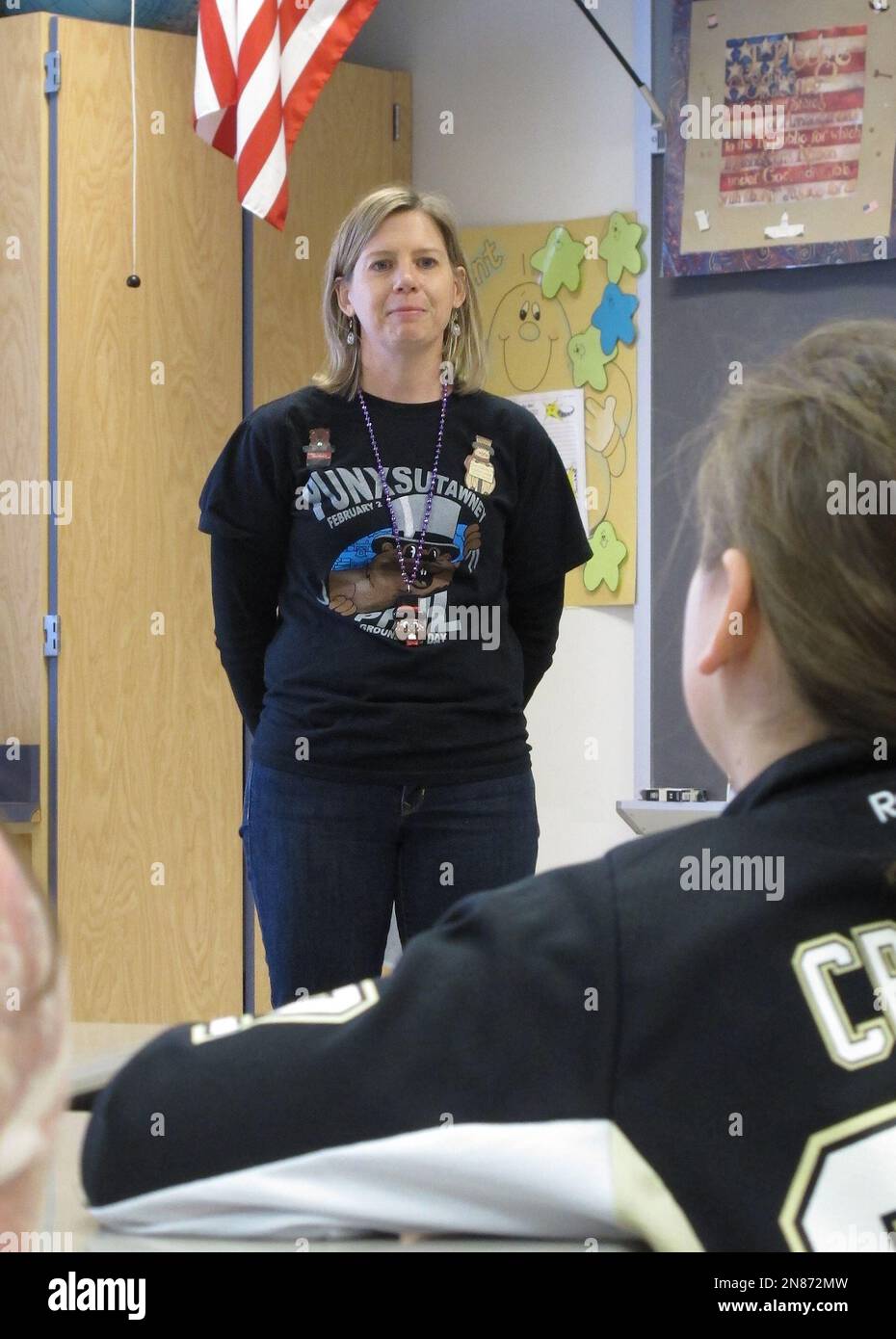 In this photo made on Thursday Jan. 31, 2013, high school math teacher ...