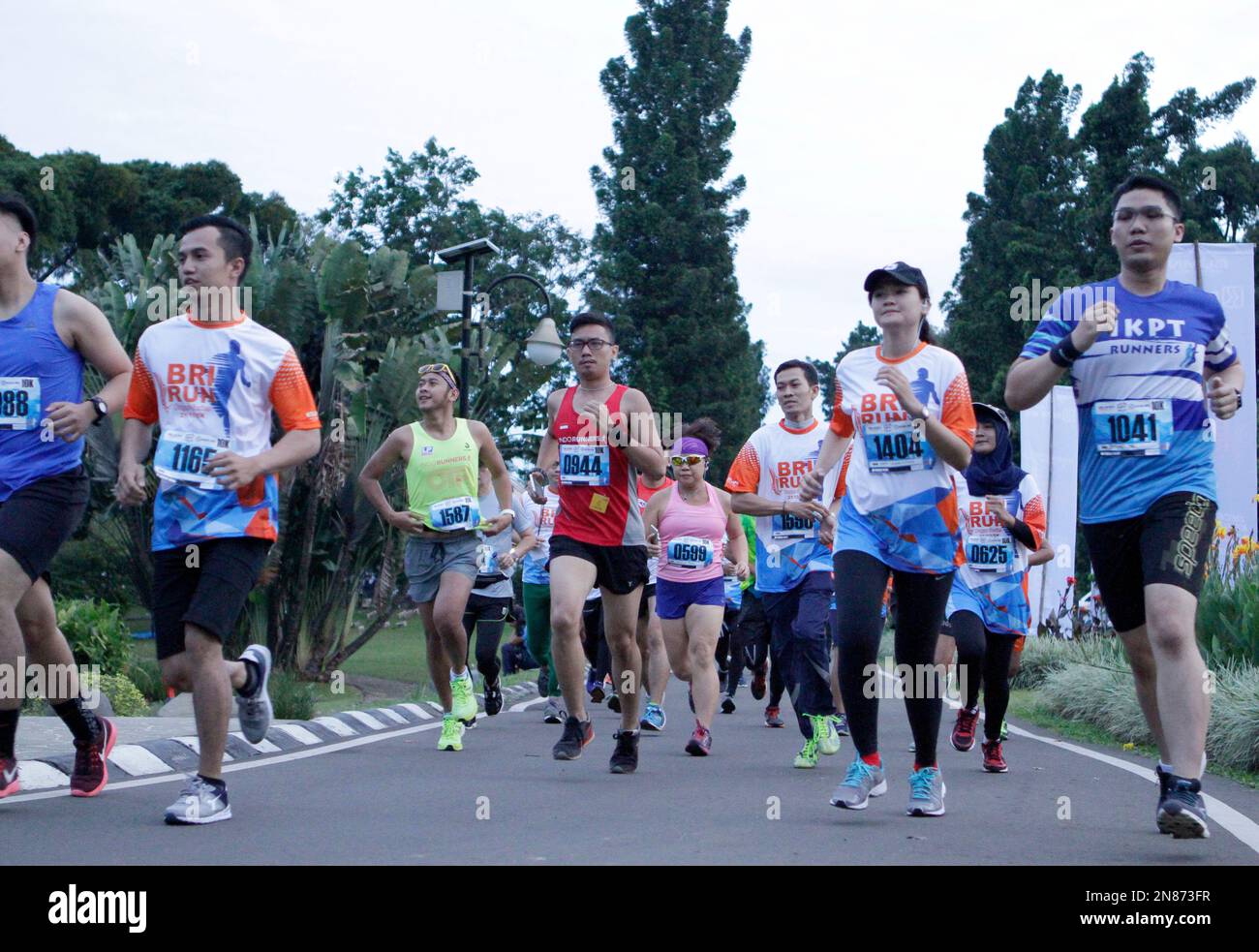 a marathon running event which is attended by many participants, both ...
