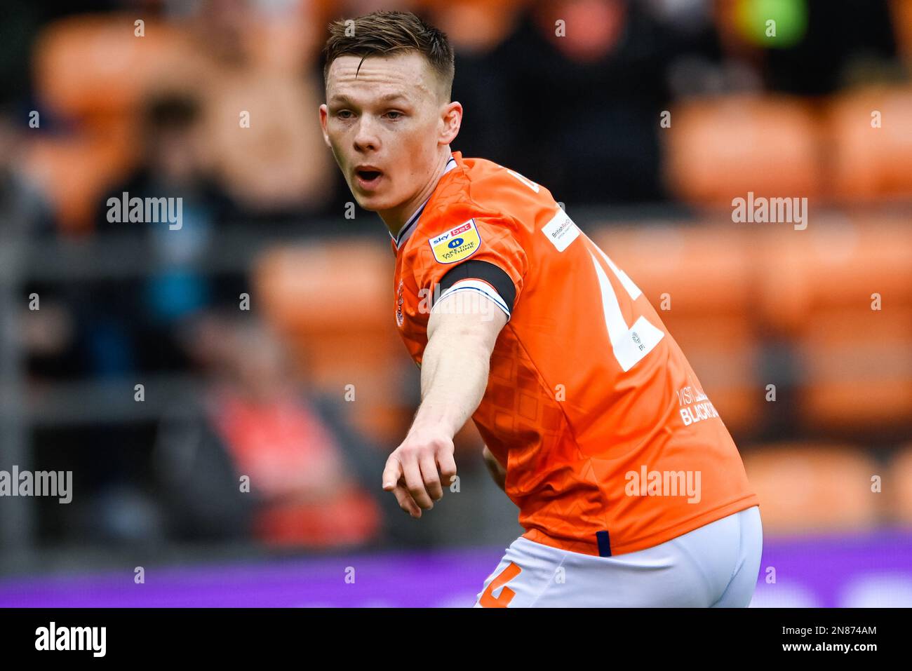 Andy Lyons #24 of Blackpool points during the Sky Bet Championship ...