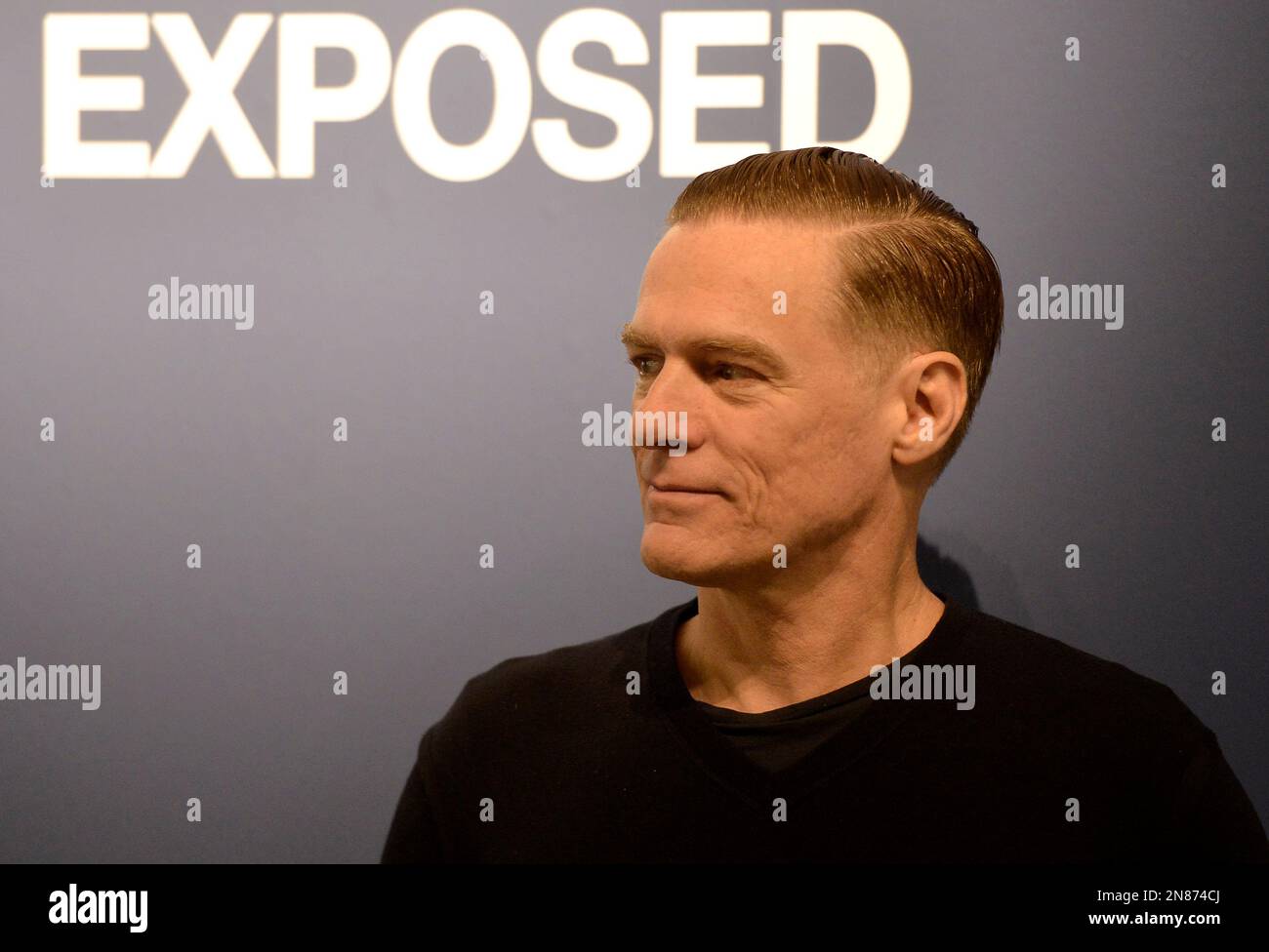 Canadian rock star Bryan Adams poses during the opening of his photo ...