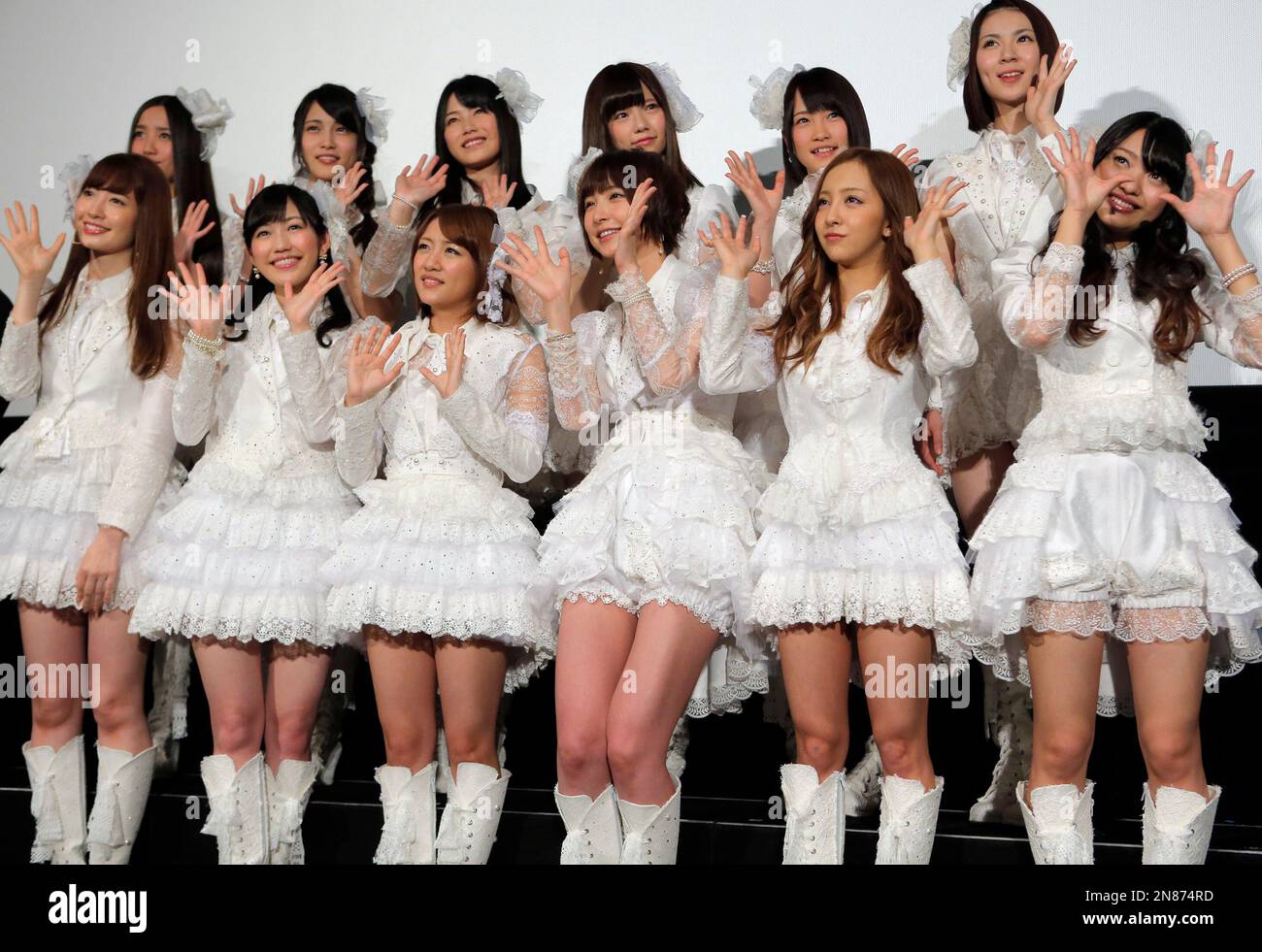 Members of Japanese girls pop gourp AKB48, from left in first row ...