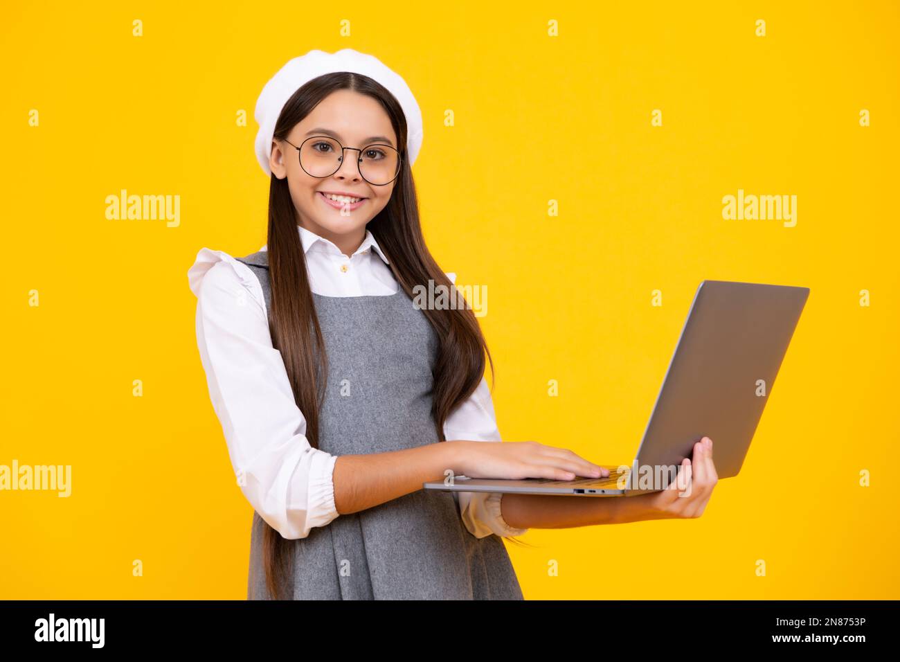 Student school girl with laptop on isolated studio background. Video ...