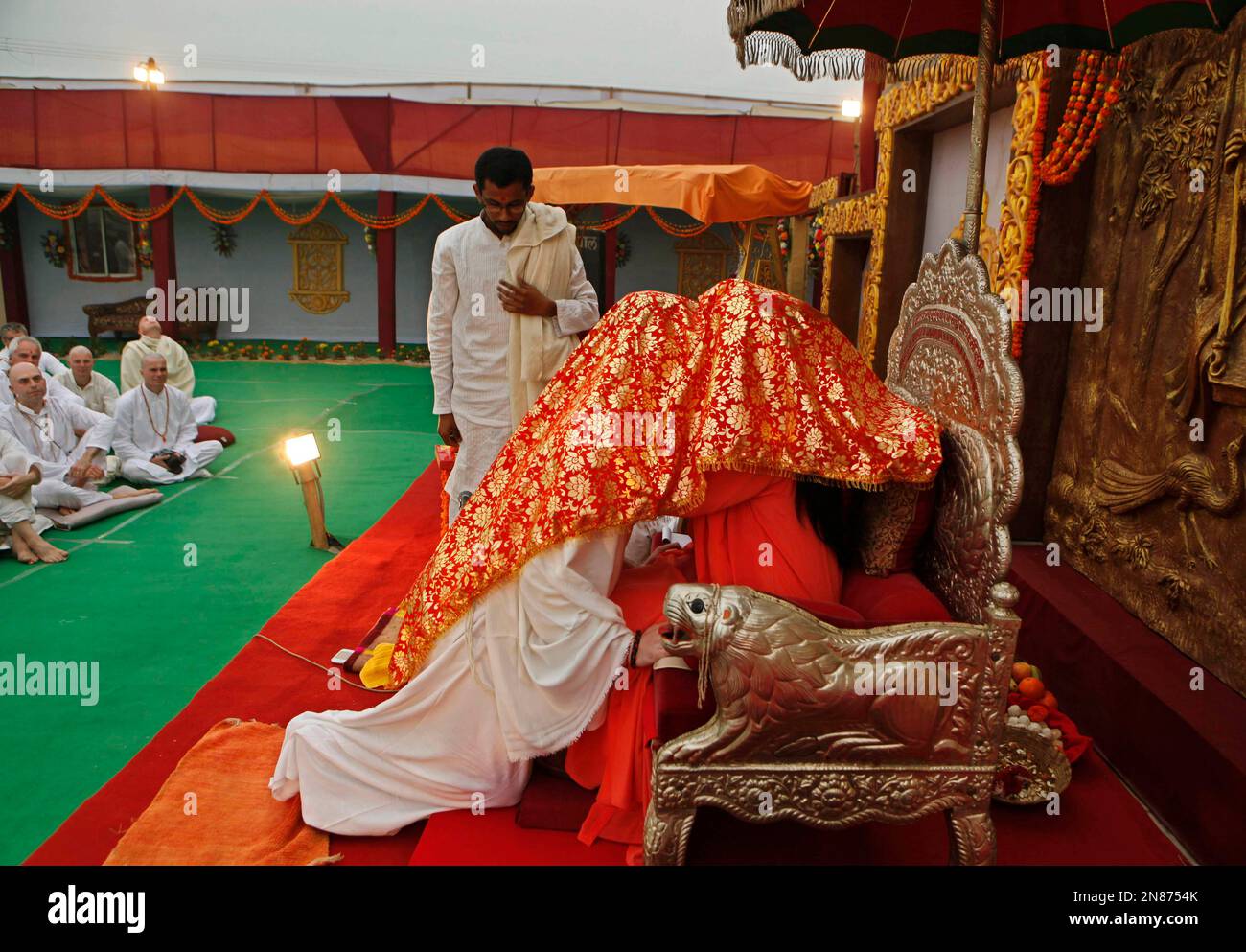 In this Thursday, Jan. 31, 2013 photo, Hindu holy woman Sai Maa, right ...