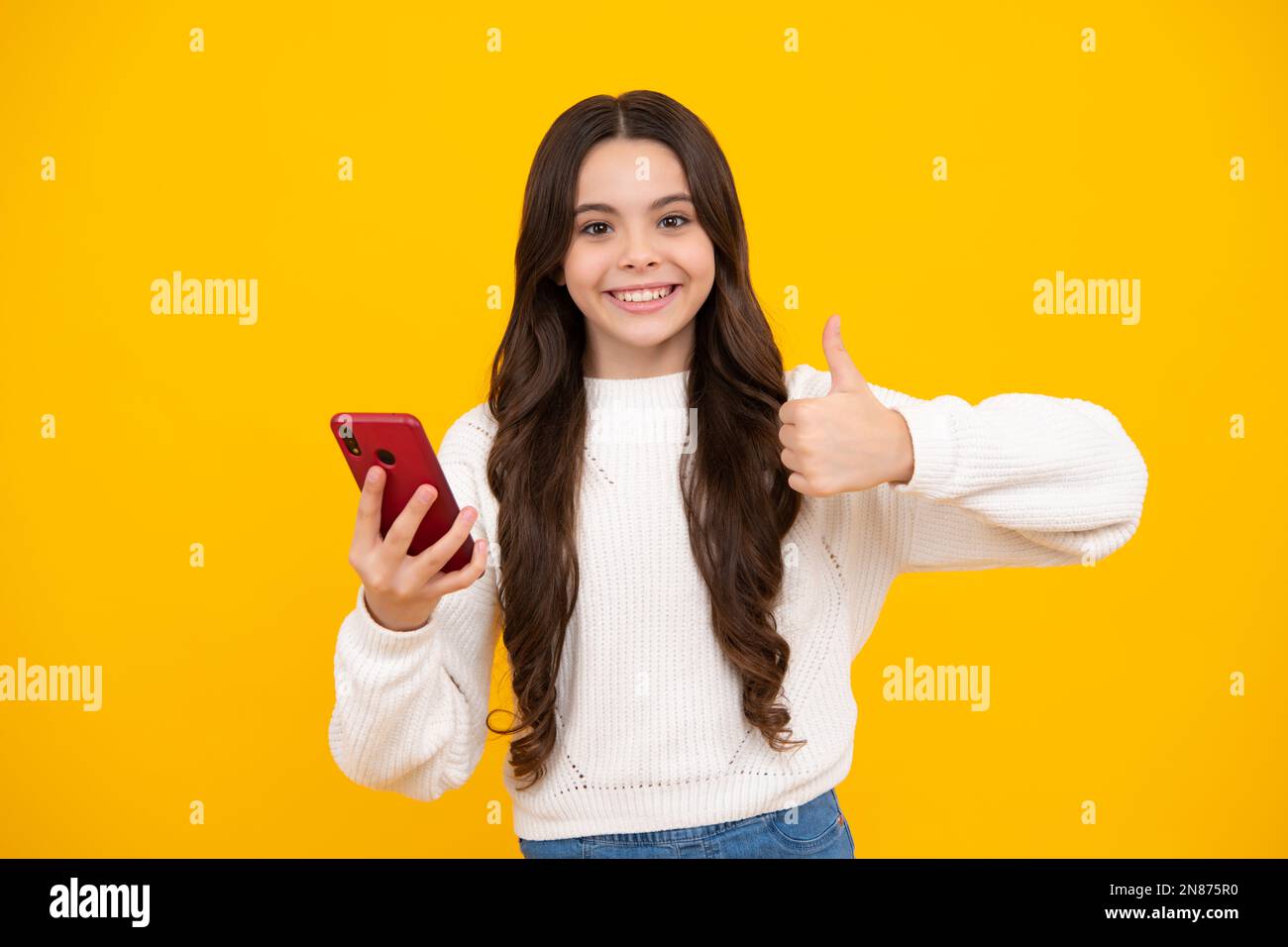 Teenage girl with smart phone. Portrait of teen child using mobile ...