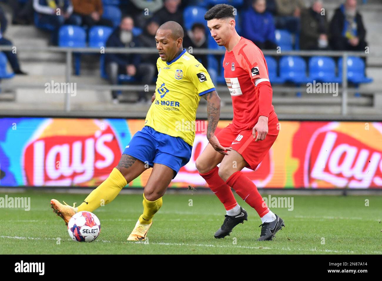 Beveren's Everton Luiz and Dender's Lennard Hens pictured in action ...
