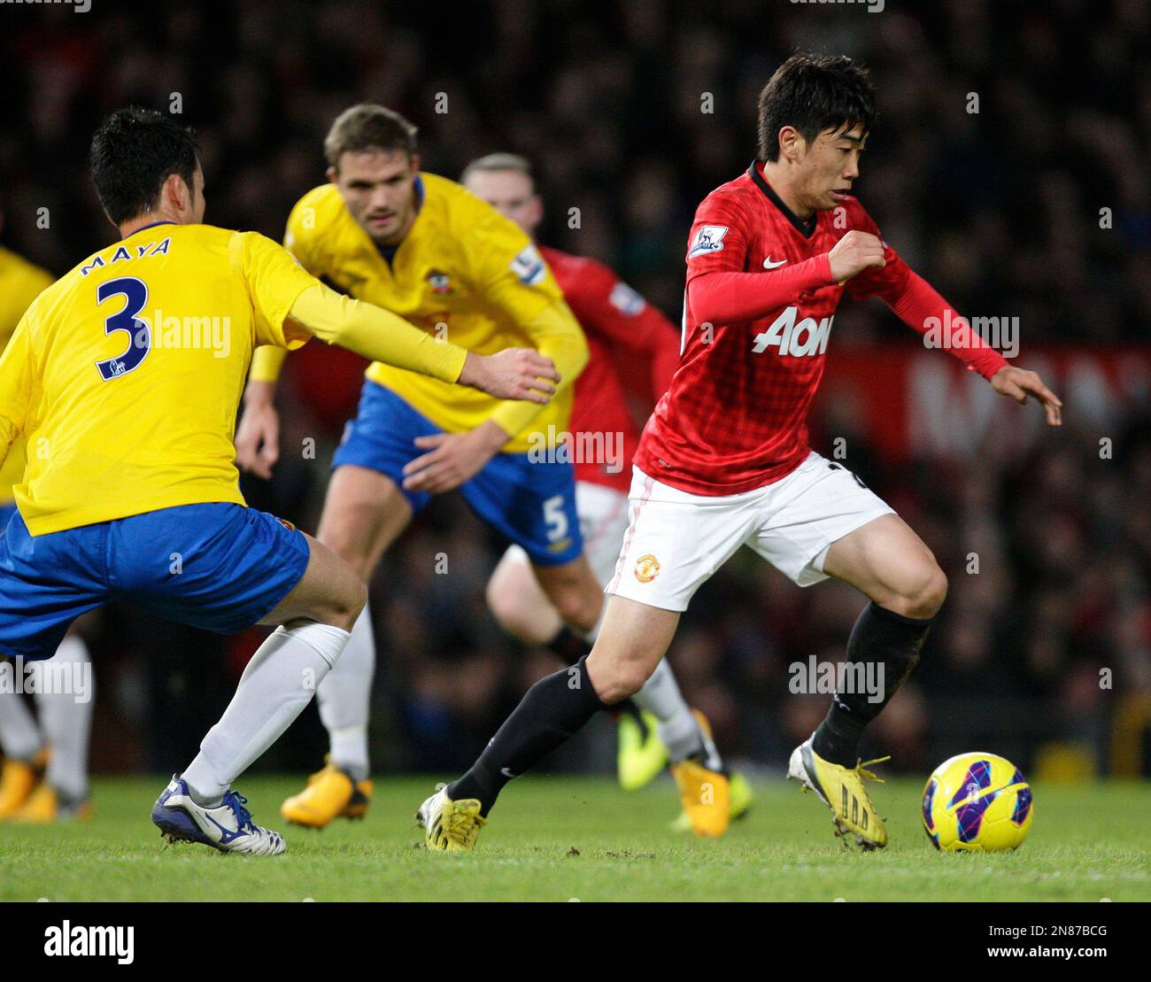 Manchester United's Shinji Kagawa runs with the ball past Southampton's ...