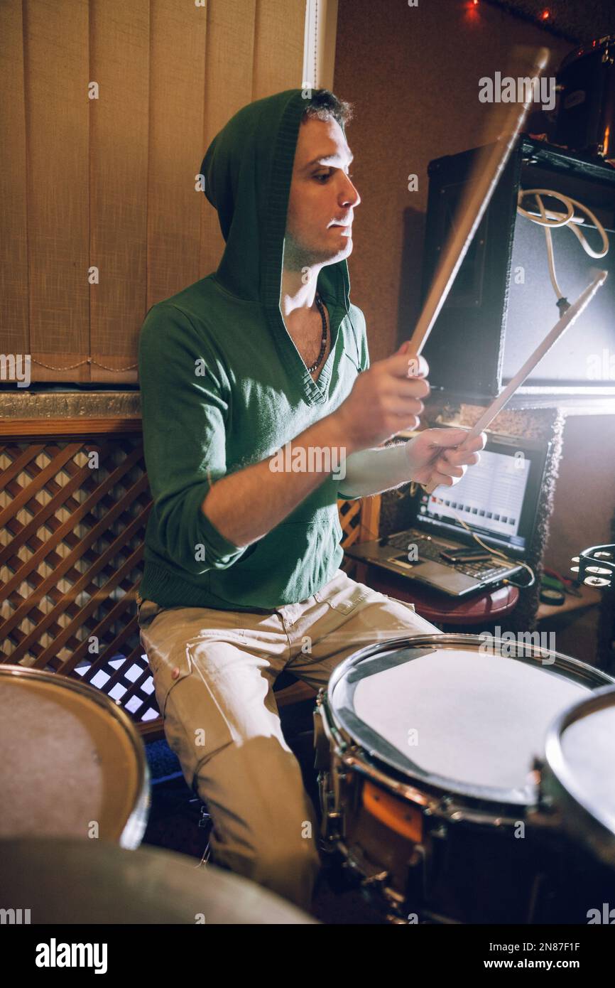 Drummer playing drums hi-res stock photography and images - Alamy