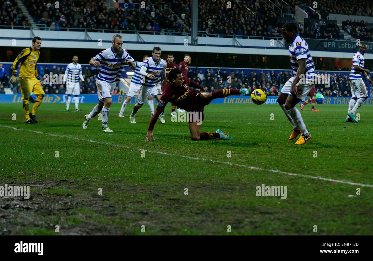 Manchester City's Scott Sinclair, center, goes for the ball during the ...