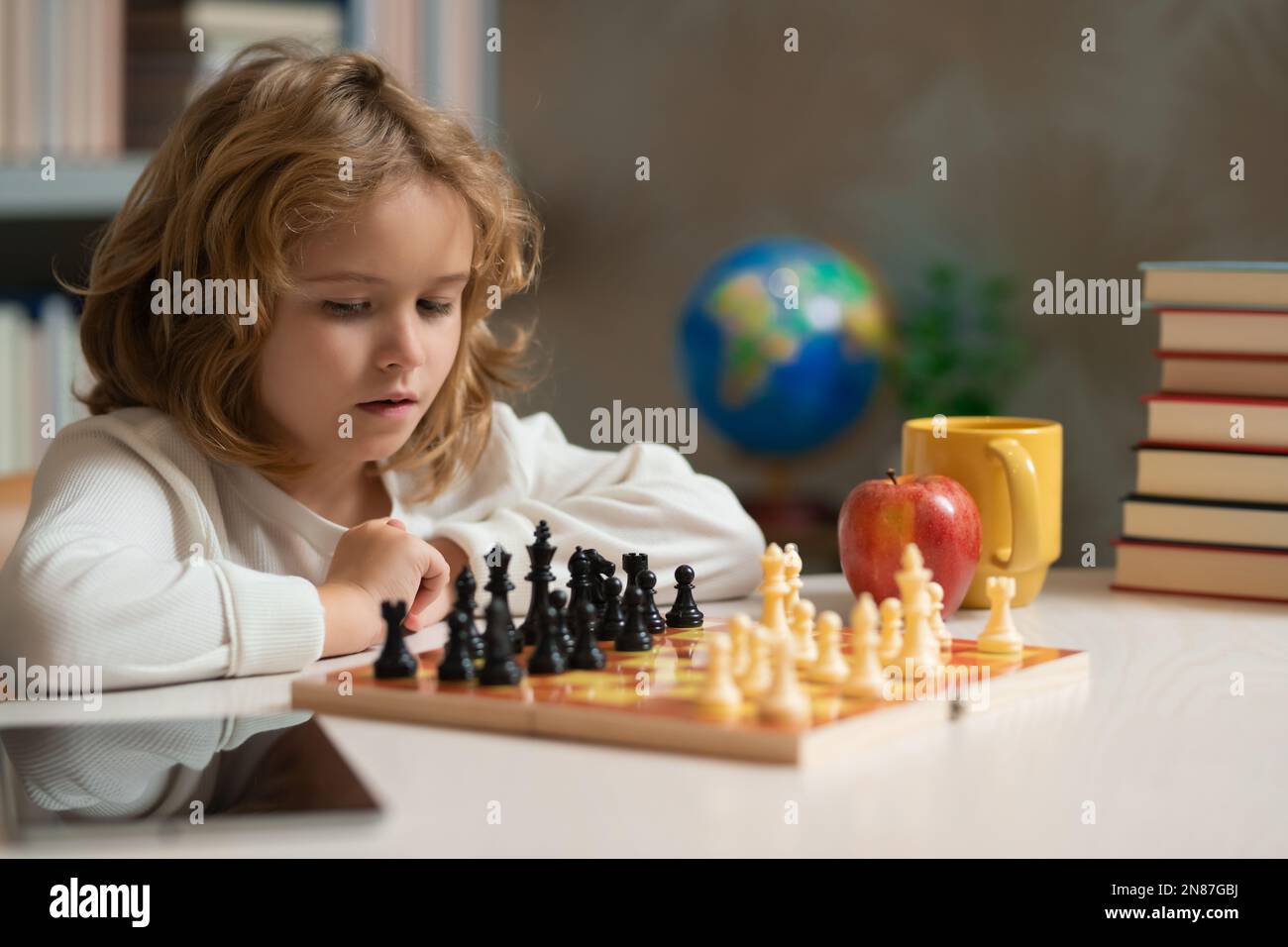 Brain development and logic. Early development. Boy thinking about ...