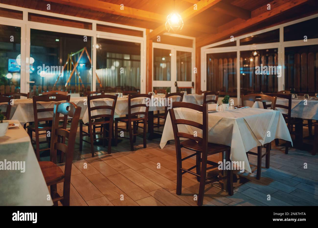 Mediterranean restaurant terrace interior with chairs Stock Photo - Alamy