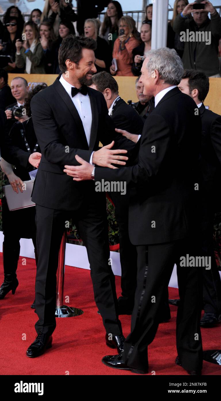 Hugh Jackman, left, greets Victor Garber at the 19th Annual Screen ...