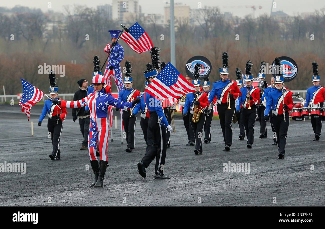 Music band's dressed and flags with in the colors of the U.S. flag seen ...