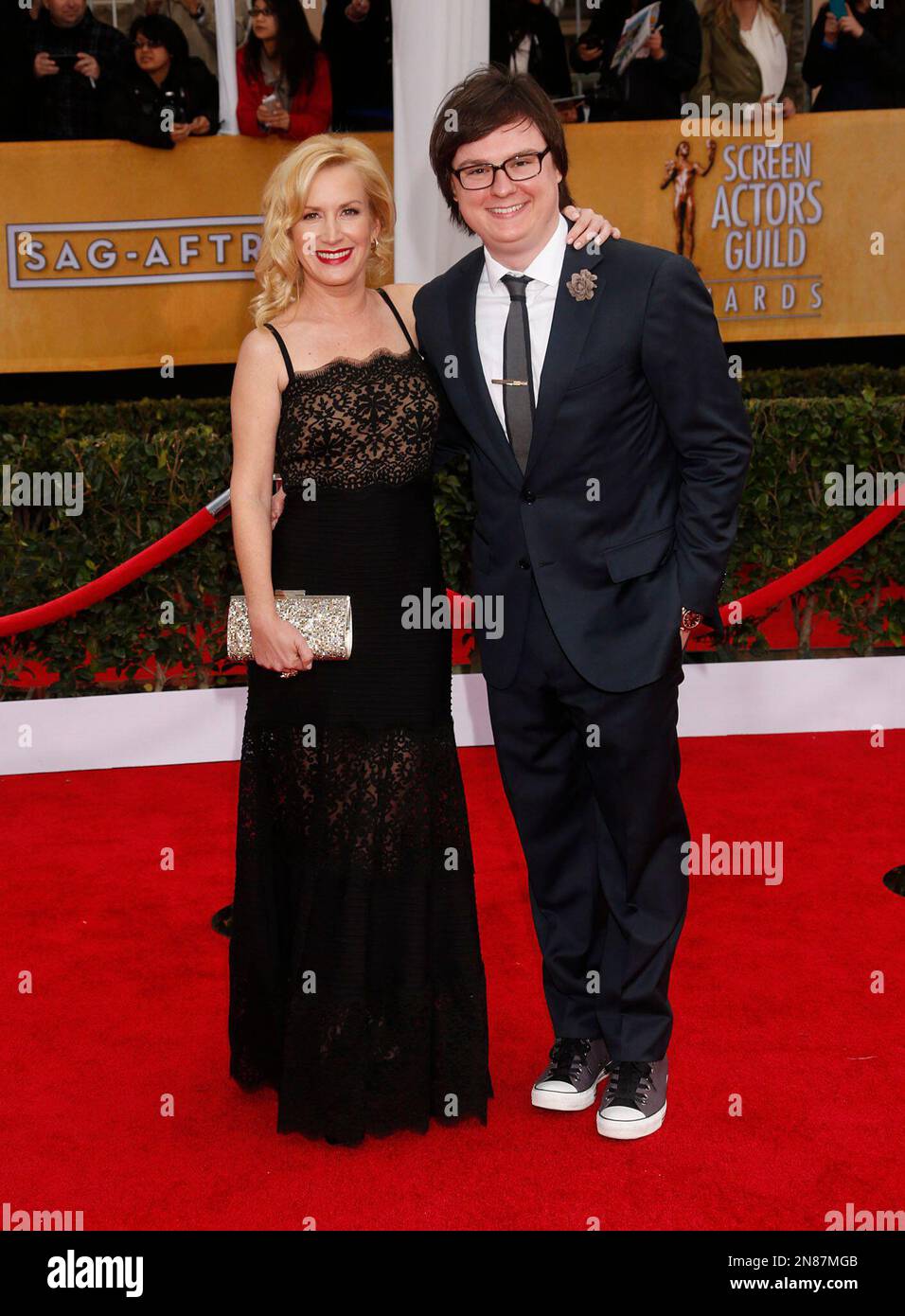 Angela Kinsey and Clark Duke arrive at the 19th Annual Screen Actors ...