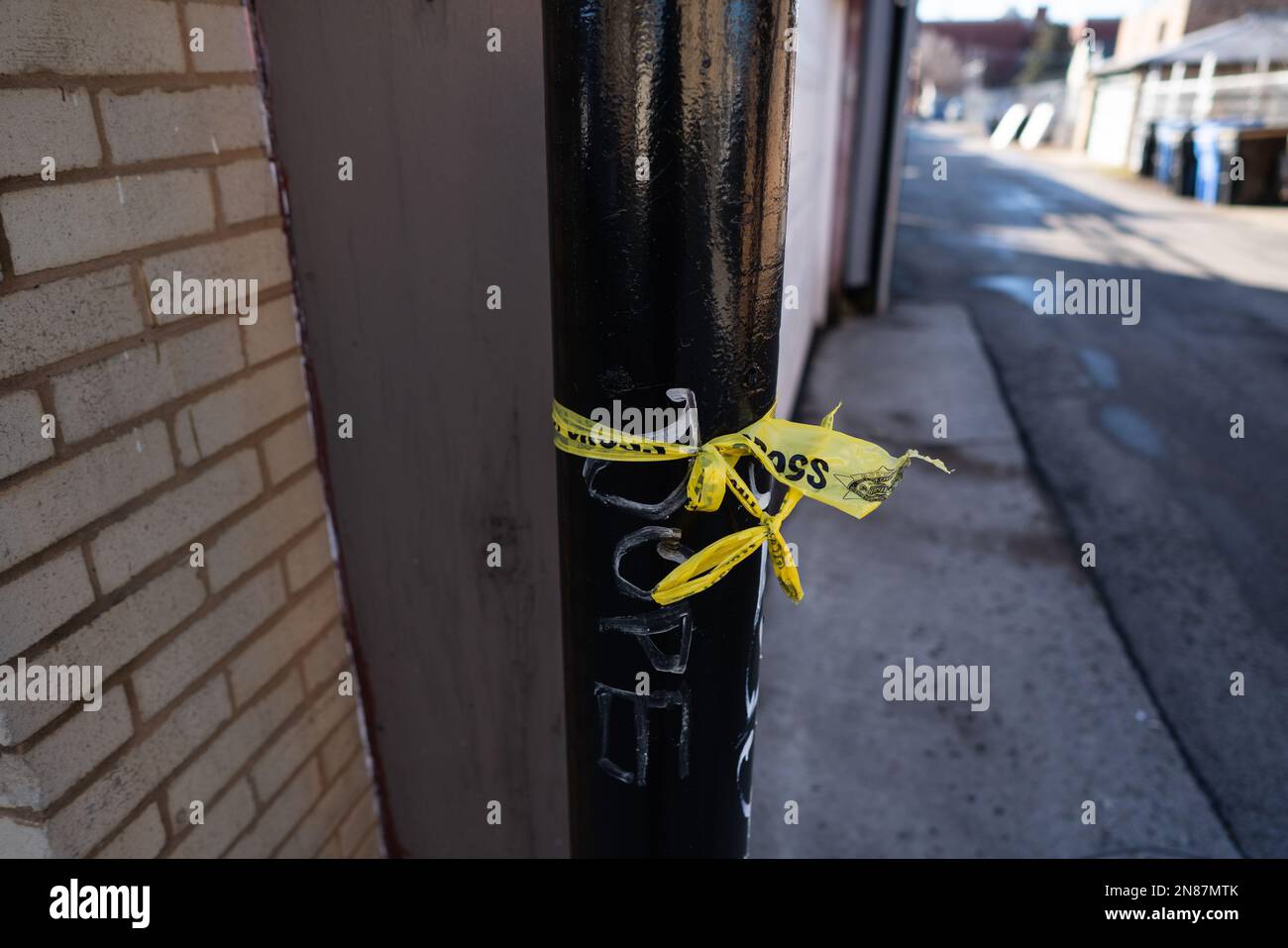Chicago, USA. 10th Feb, 2023. Remnants of crime scene tape is seen on ...