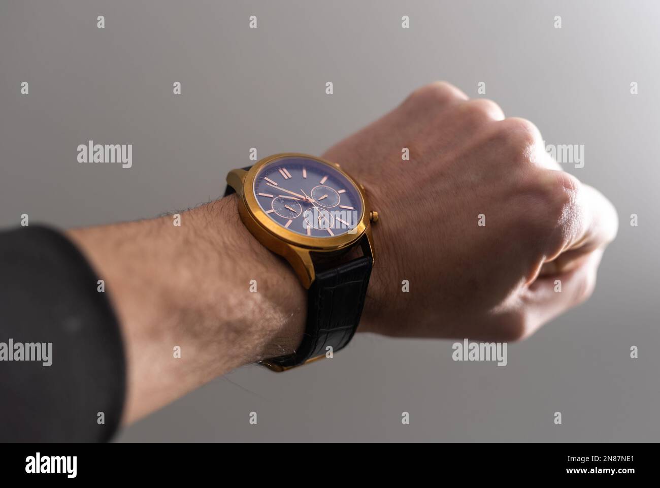 A watch on a man's hand of a man, a close-up of a man's watch on his ...