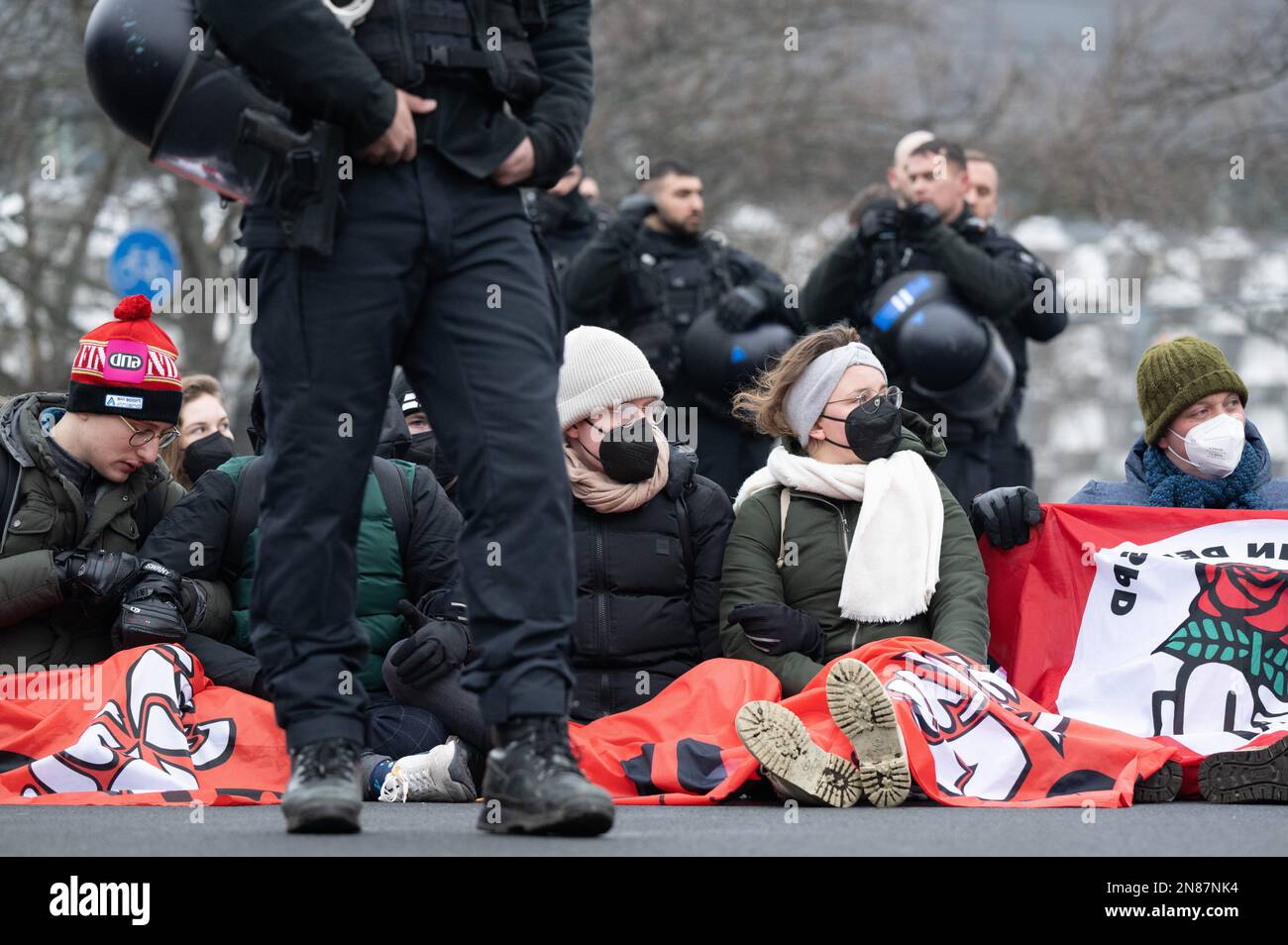 Dresden, Germany. 11th Feb, 2023. Counter-demonstrators protest with a ...