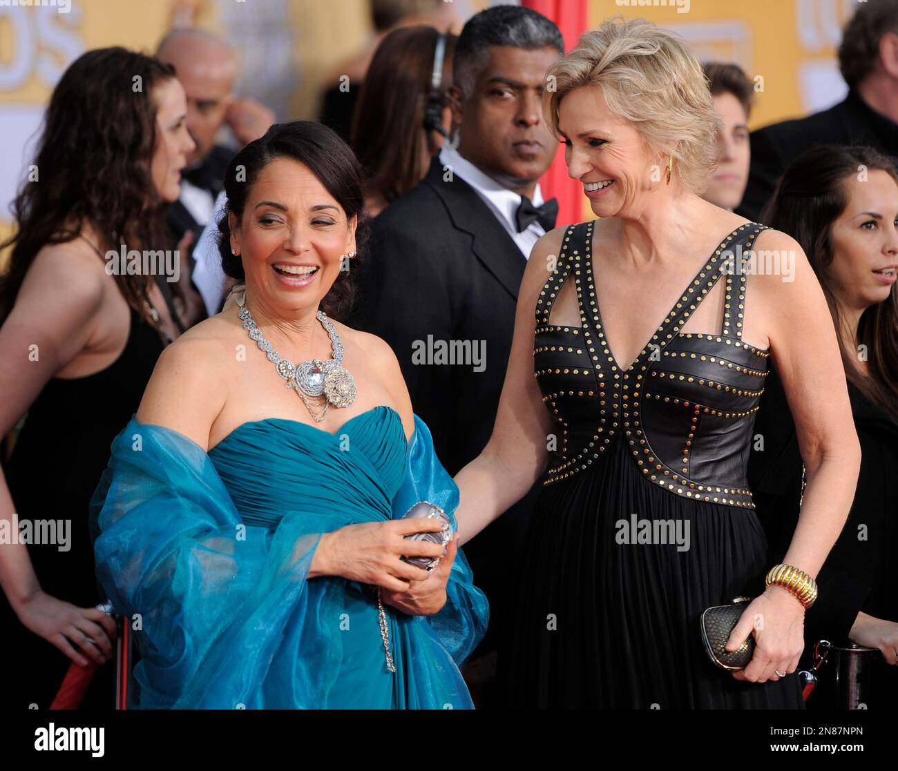 From left, Catherine Rusoff and Jane Lynch arrive at the 19th Annual ...