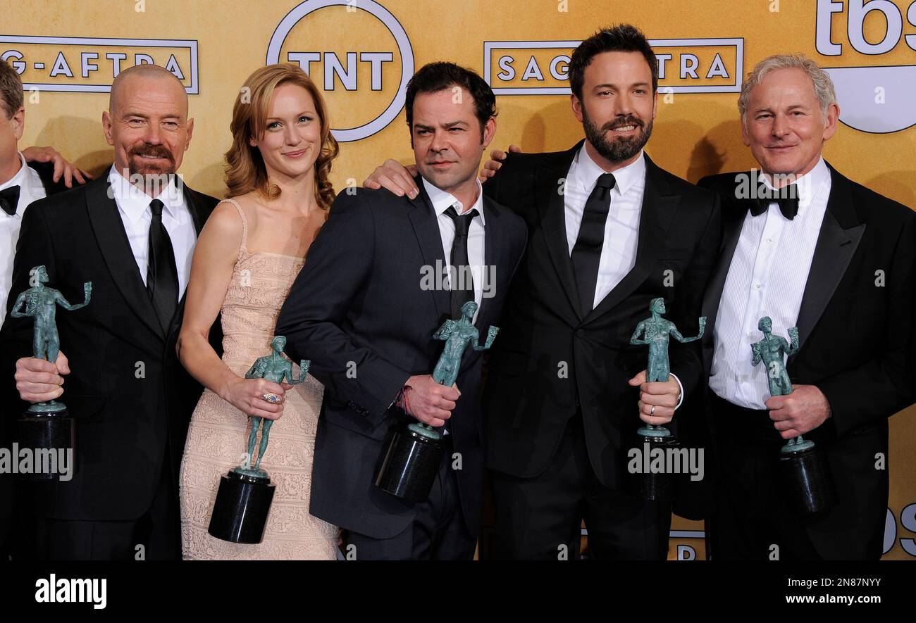 The cast of "Argo" poses backstage with the award for best cast in a ...