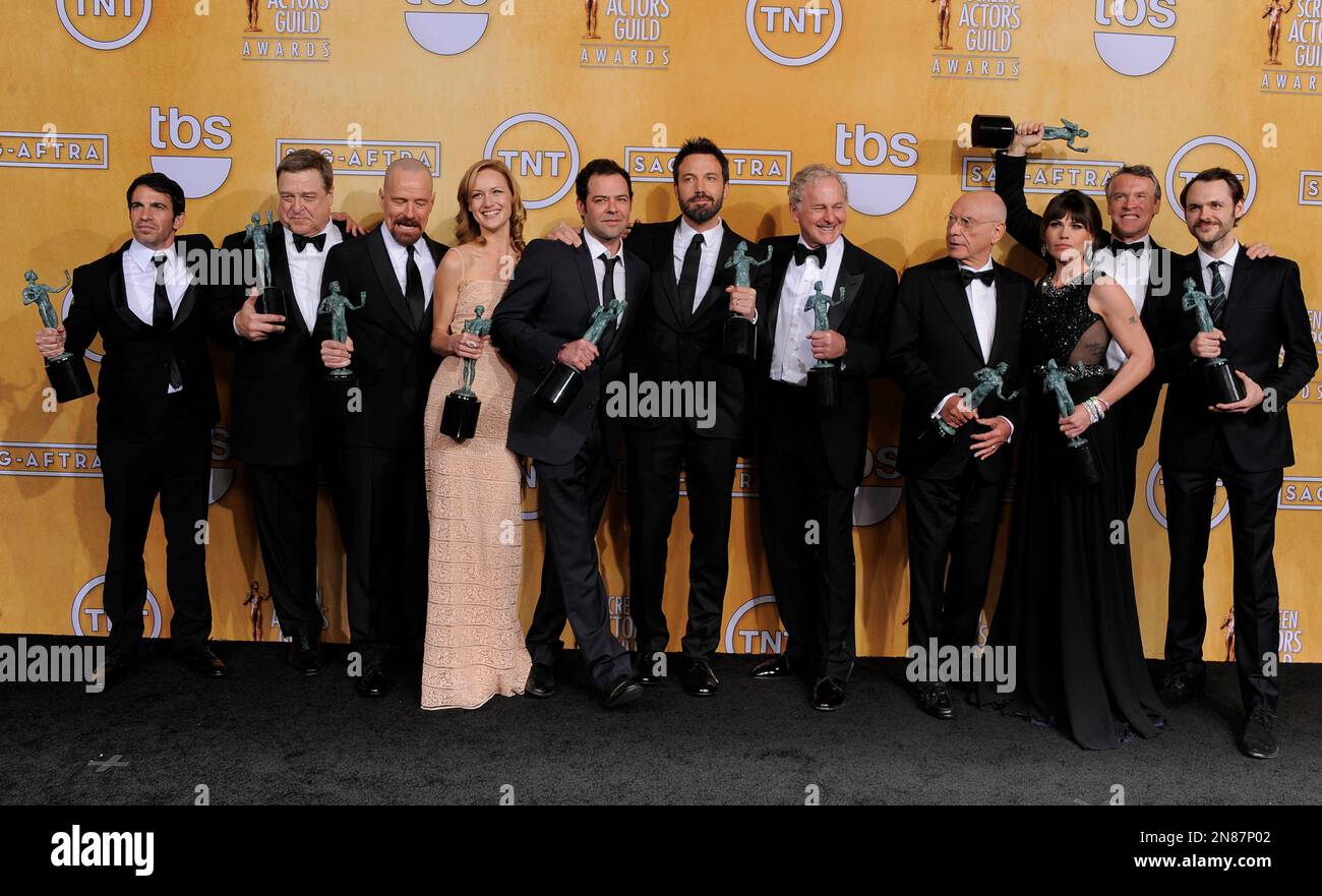 The cast of "Argo" poses backstage with the award for best cast in a motion picture at the 19th ...