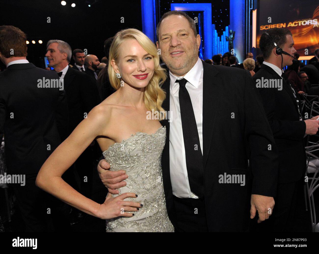 Naomi Watts, left, and Harvey Weinstein pose in the audience at the ...