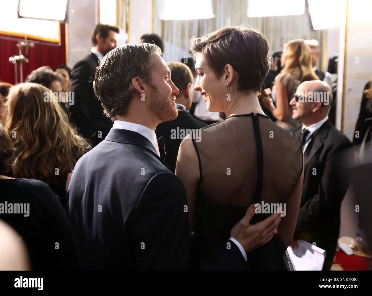Adam Shulman, left, and his wife actress Anne Hathaway arrive at the ...