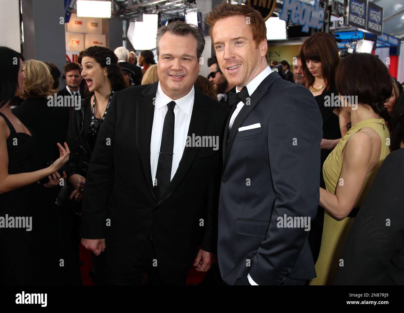 Actors Eric Stonestreet, left, and Damian Lewis arrive at the 19th ...