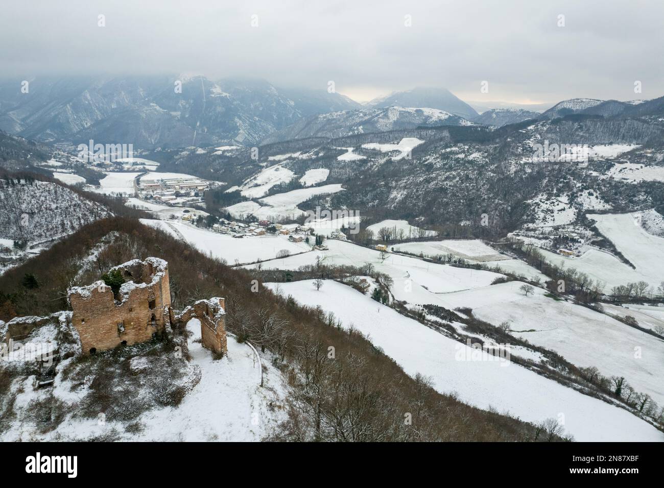 Aerial view of castle ruins in Marche region in Italy during winter ...