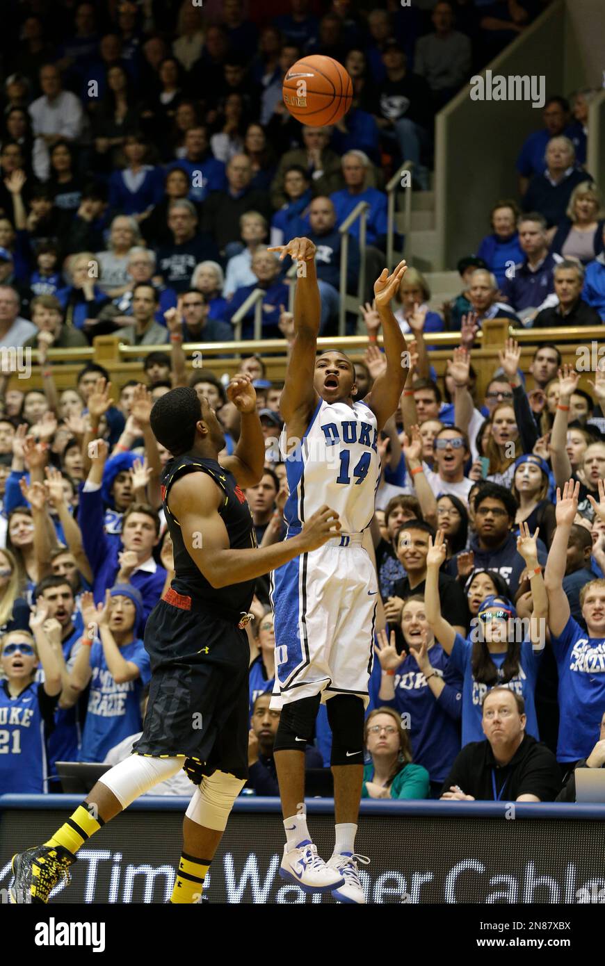Duke's Rasheed Sulaimon (14) shoots over Maryland's Pe'Shon Howard ...