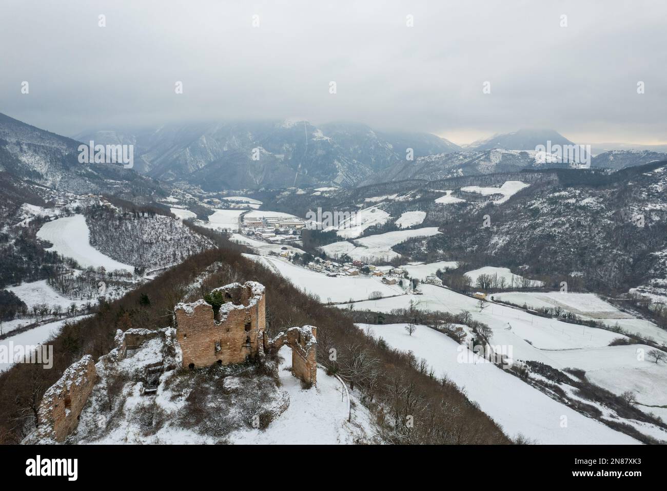 Aerial view of castle ruins in Marche region in Italy during winter ...