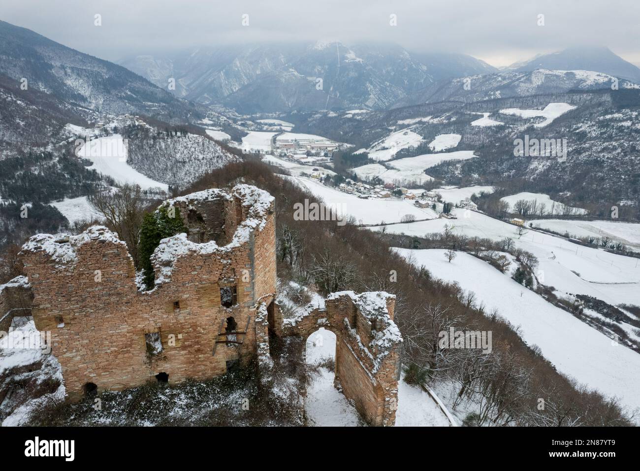 Aerial view of castle ruins in Marche region in Italy during winter ...