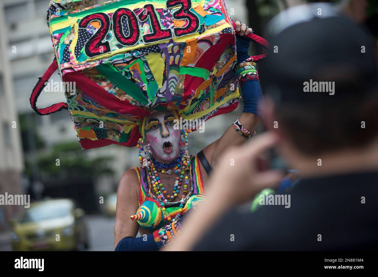 Eduardo Rasberge, 48, known as Suitcase Woman wears a decorative ...